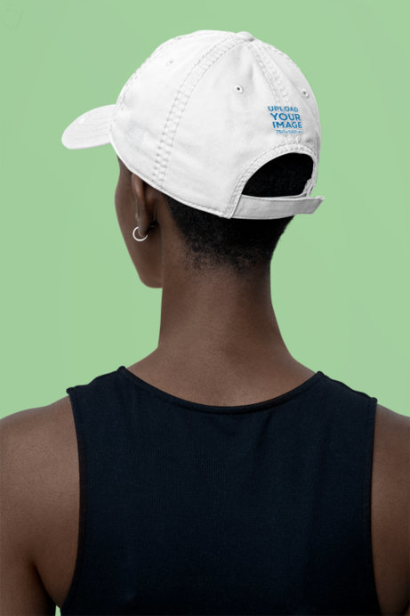 Placeit - Back-View Dad Hat Mockup Featuring a Woman Standing in a Studio