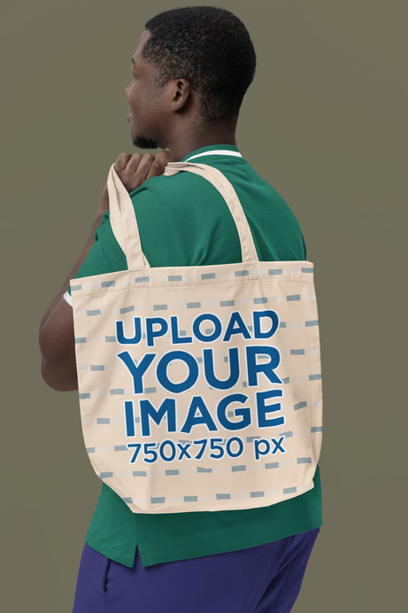 Placeit - Mockup of a Man Carrying an Econscious Tote Bag over His Shoulder