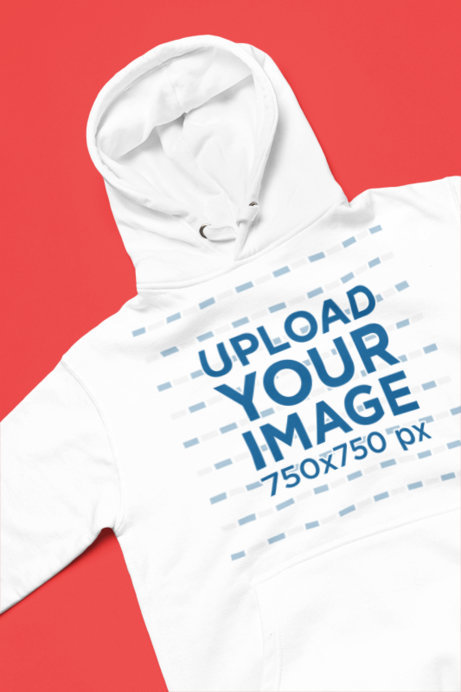 Placeit - Mockup of a Cotton Heritage Pullover Hoodie Lying on a ...