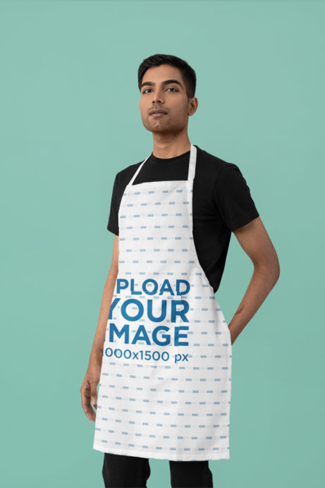 Placeit - Kodenipr Club Apron Mockup of a Serious Man Standing in a Studio