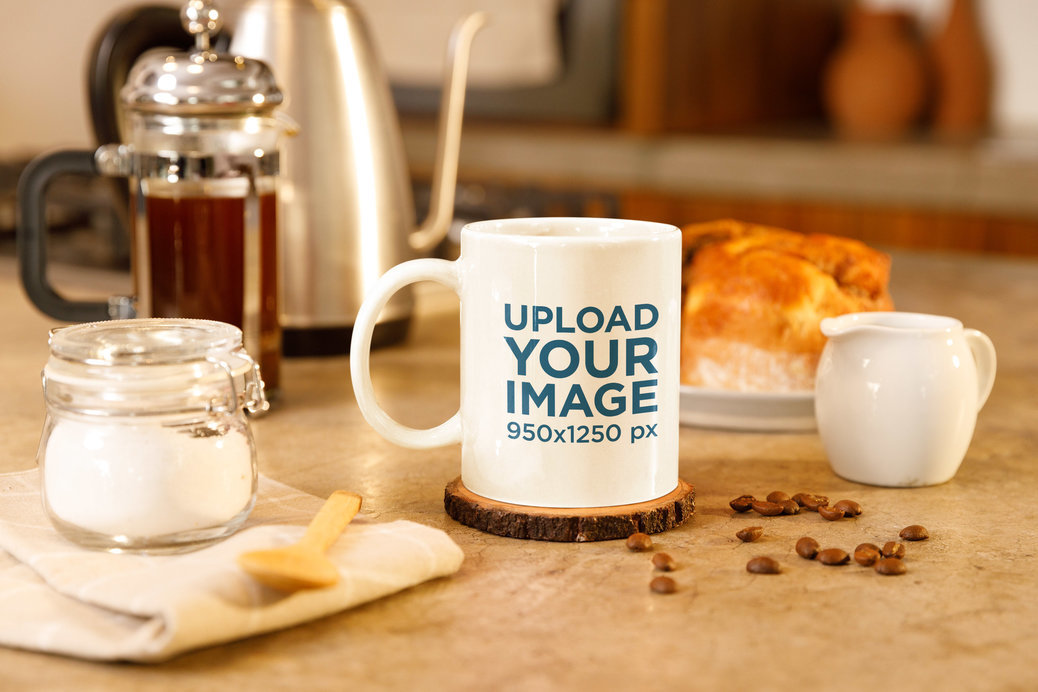 Placeit - Mockup of an 11 oz Mug Placed on a Table with Coffee Beans ...