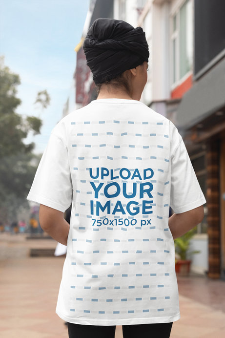Placeit - Back-View Blinkstore Tee Mockup of a Woman Wearing a Turban