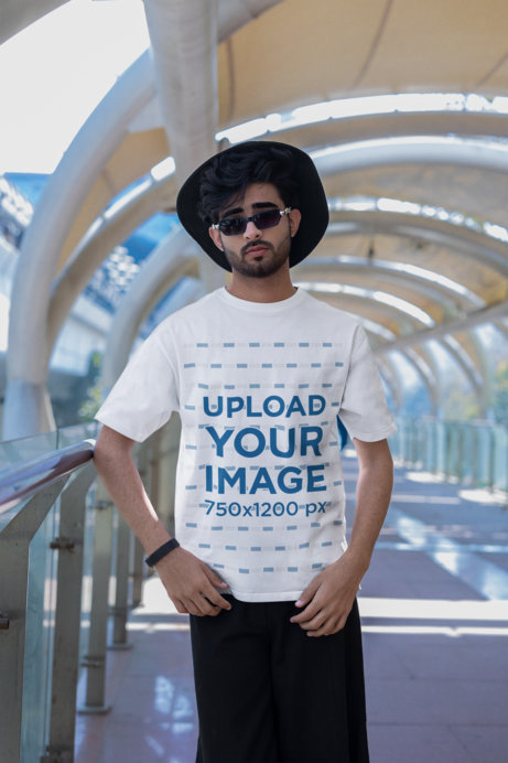 Placeit - Blinkstore T-Shirt Mockup Featuring a Serious Man Getting ...