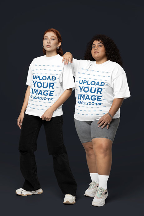 Placeit - Mockup of Two Women Standing Together and Wearing Oversized T ...