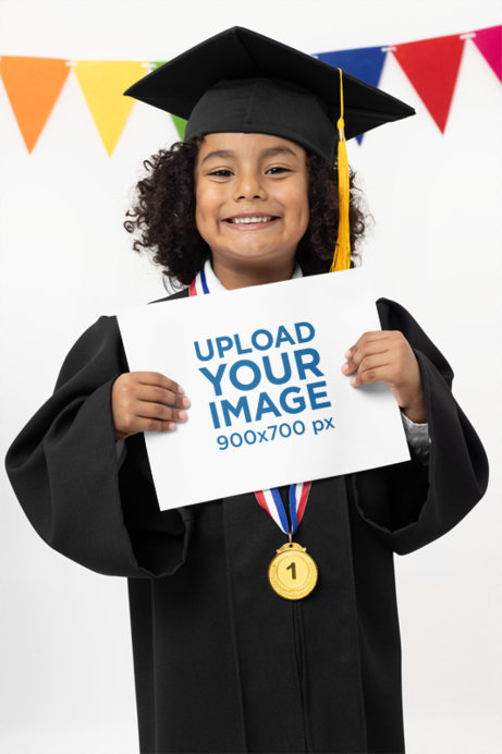 Placeit - Mockup of a Cheerful Boy Holding a Diploma in a School Graduation
