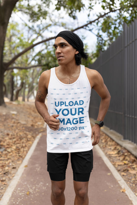Placeit - Bella Canvas Tank Top Mockup Featuring a Tattooed Man Running ...