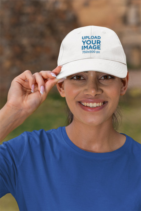 Placeit - Closeup Mockup of a Smiling Woman Wearing a Dad Hat