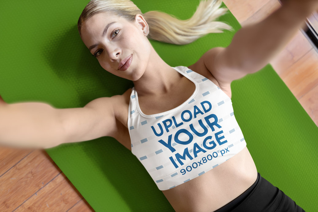 Placeit - Sports Bra Mockup Featuring a Woman Taking a Selfie With a ...