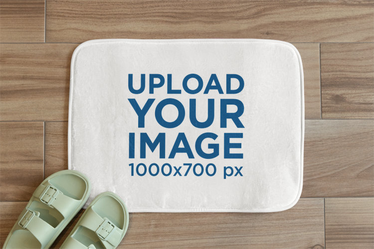 Placeit - Bath Mat Mockup Featuring a Wooden Floor and a Pair of Sandals