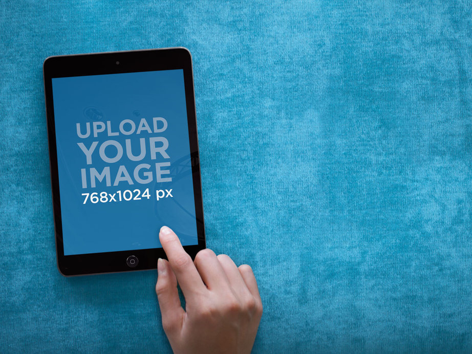 Placeit - Tablet Mockup Featuring a Black iPad Mini on Vibrant Blue ...
