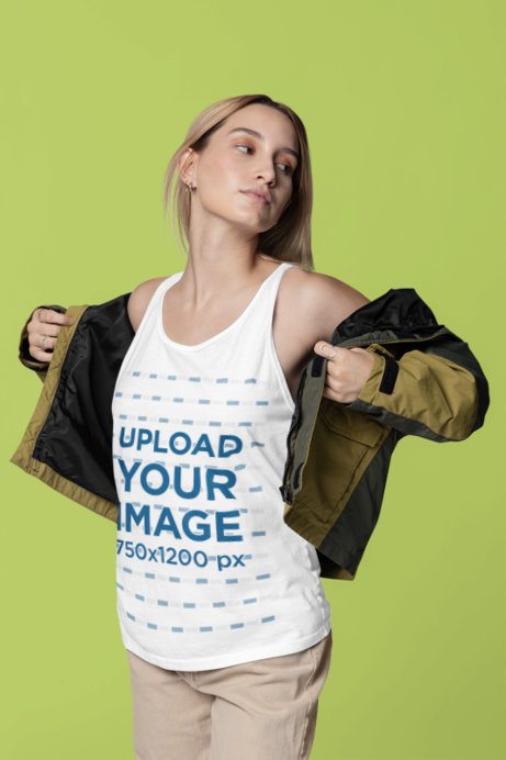 Placeit - Mockup Featuring a Woman Styling a Bella Canvas Tank Top in a ...