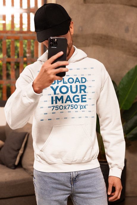 Placeit - Selfie Mockup of a Man Wearing a Gildan Hoodie and a Homemade ...