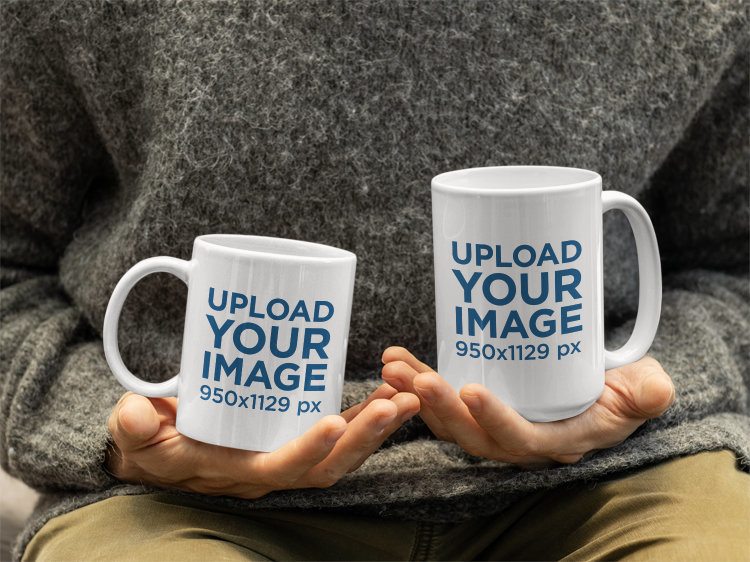 Placeit - Drinkware Mockup Featuring a Person Holding Coffee Mugs in ...