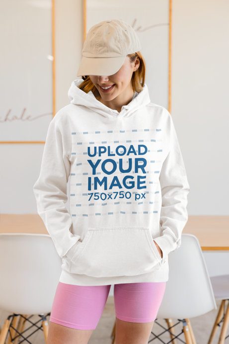 Placeit - Comfort Colors Hoodie Mockup of a Smiling Woman Posing in a ...
