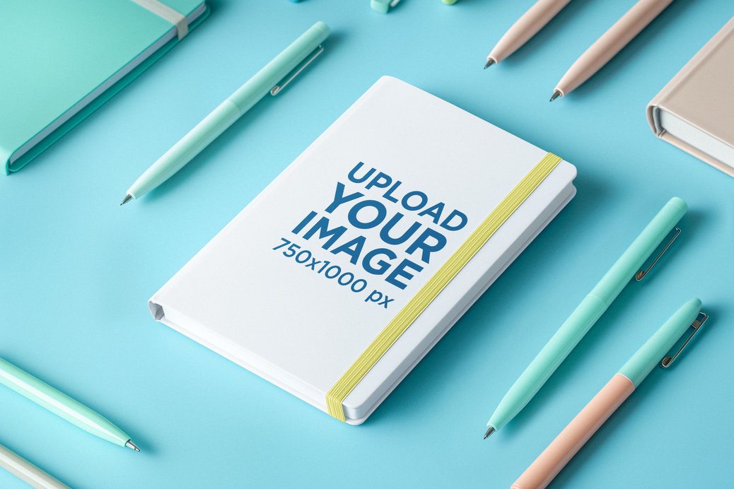 Placeit - Hardcover Journal Mockup Featuring AI-Created Colorful Pens