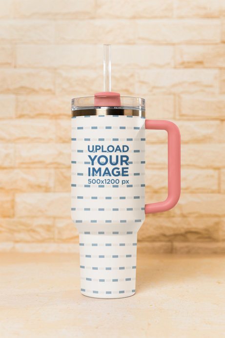 Placeit - Stanley Mockup Featuring a Tumbler Placed Against a Brick Wall
