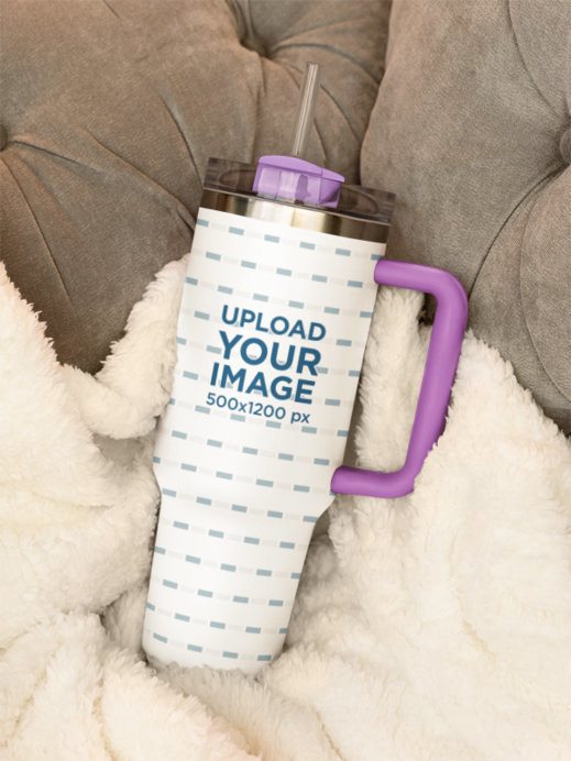 Placeit - Stanley Tumbler Mockup Featuring a Cozy Sofa