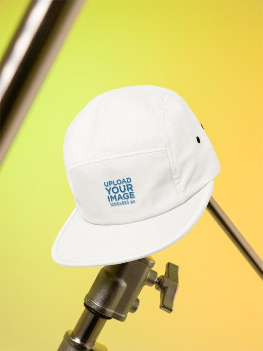 Placeit - Yupoong Mockup Featuring a Panel Cap Hat Placed on a Steel ...