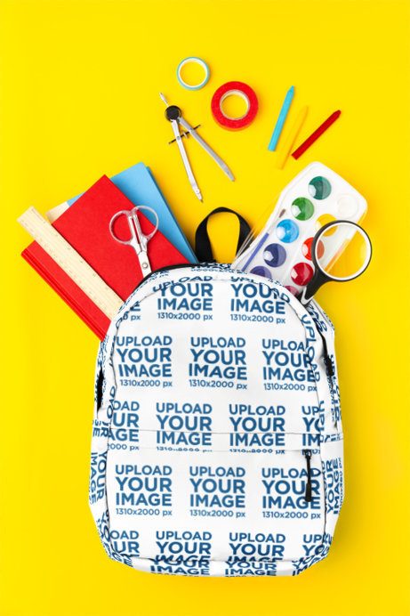 Placeit - Mockup of a Sublimated Backpack Filled With School Supplies
