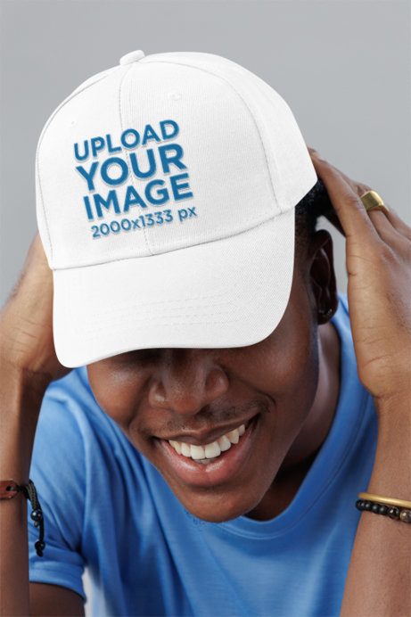 Placeit - Embroidered Dad Hat Mockup Featuring a Cheerful Man Posing in ...
