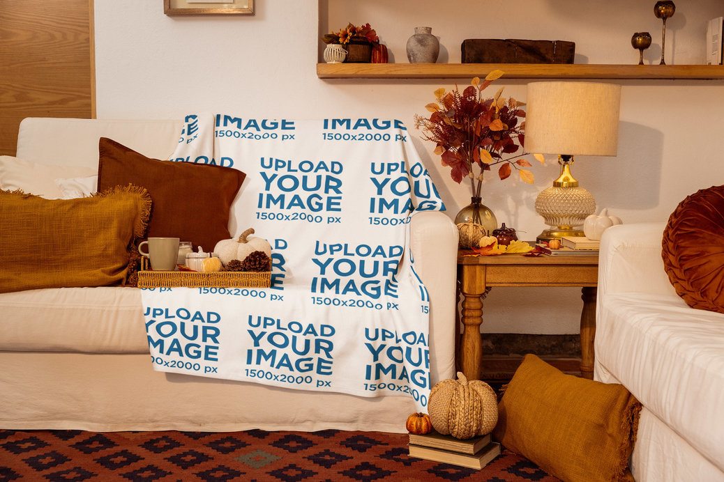 Placeit - Mockup of a Blanket Lying on a Couch in a Cozy Living Room ...