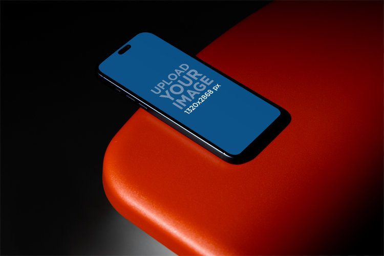 Placeit - Mockup Featuring an iPhone 17 Pro Max Placed Near the Edge of ...