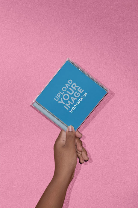 Placeit - Mockup of a CD Cover in Front of a Solid Background