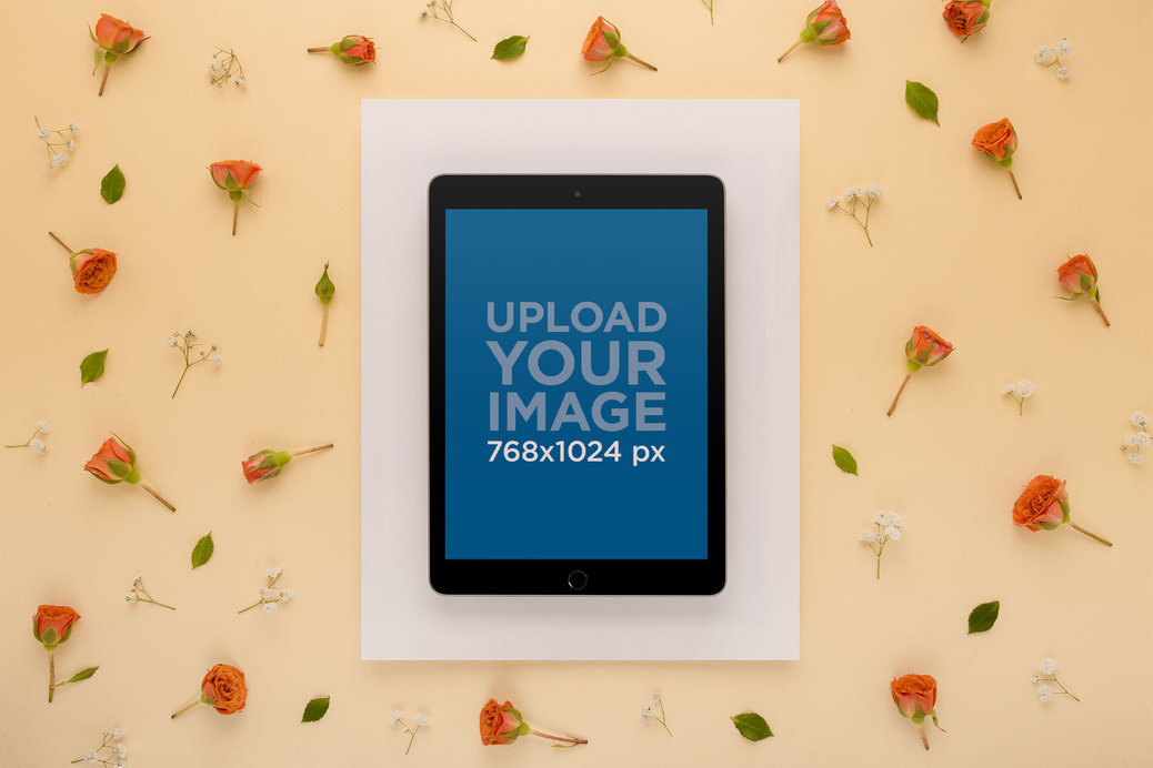 Placeit - iPad Mockup Surrounded by Orange Roses
