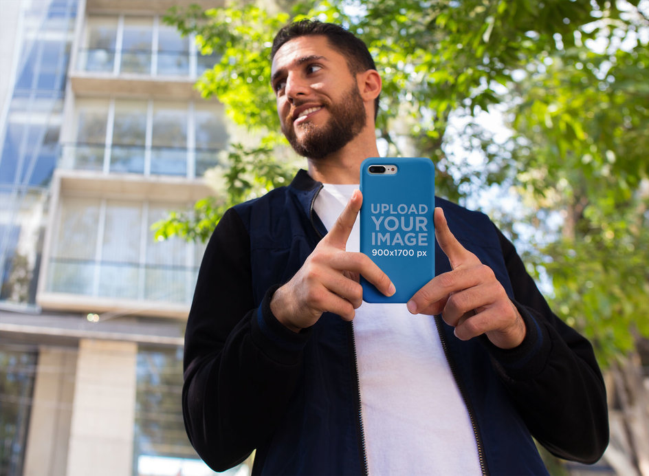 Placeit - iPhone Case Mockup Featuring a Man on the Street
