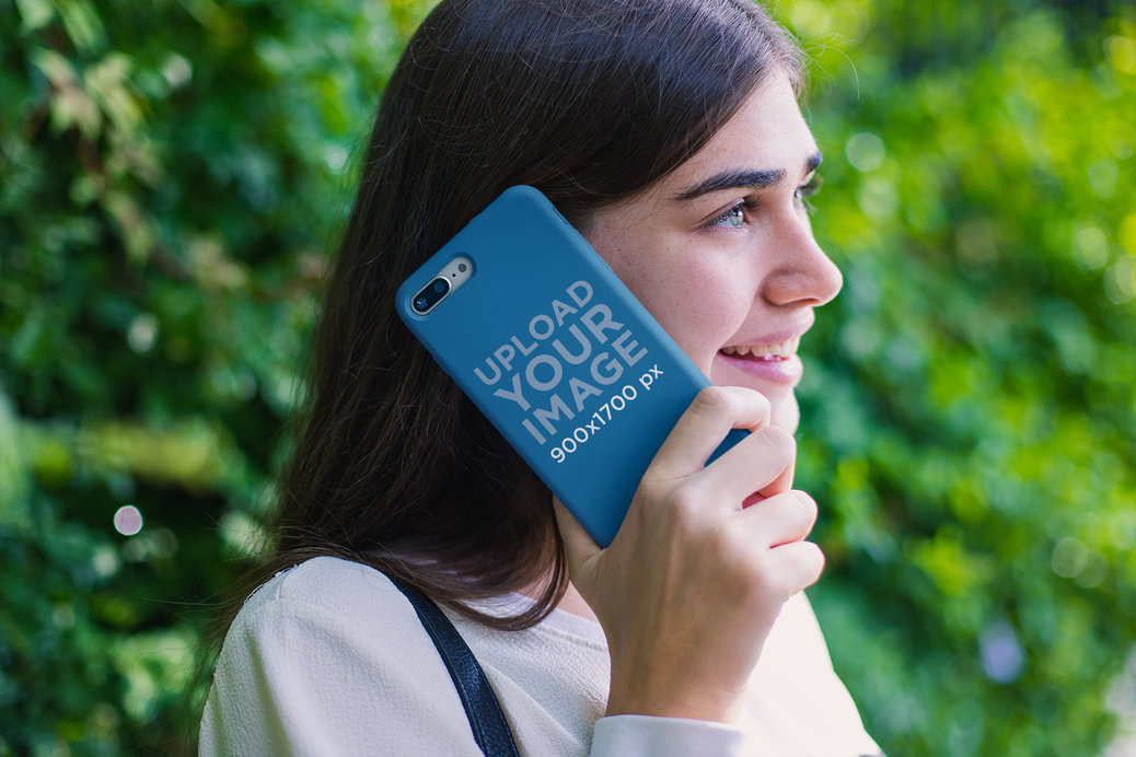 Placeit - Mockup of a Woman Holding a Phone Case Against Her Ear