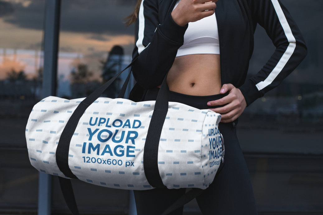 Placeit - Mockup of a Kit Bag Modeled by a Woman