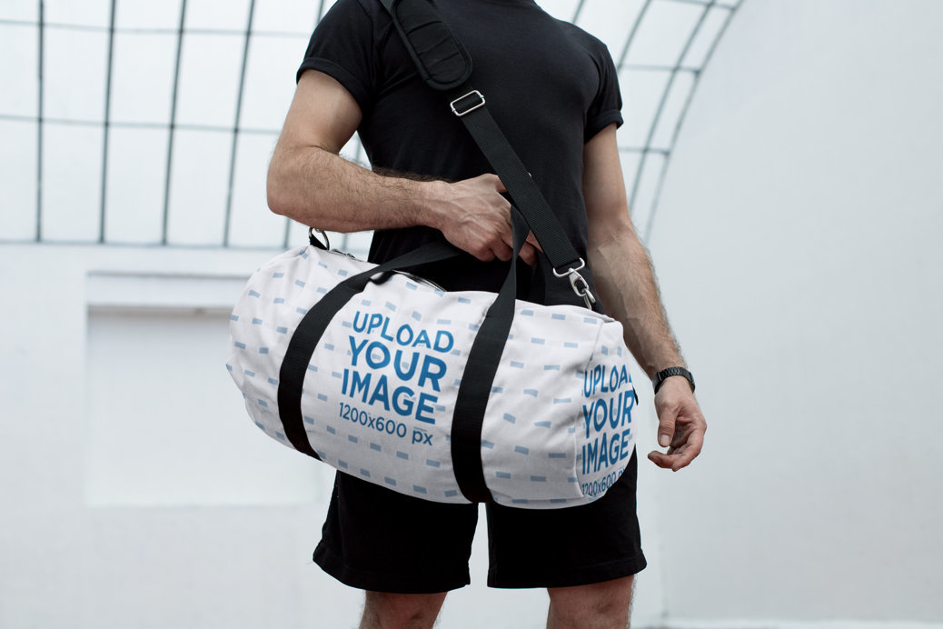 Placeit - Mockup of a Kit Bag Carried Around a Man's Shoulder