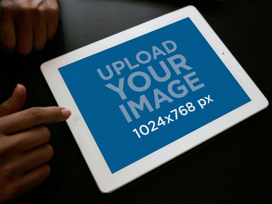 Placeit - Mockup of a White iPad on Table