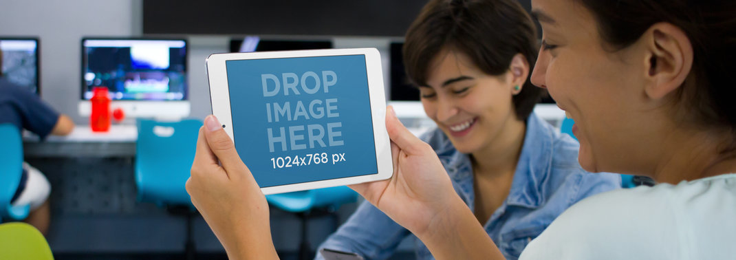 Placeit - Tablet Mockup of a Female Student in a Computer Room Using an ...