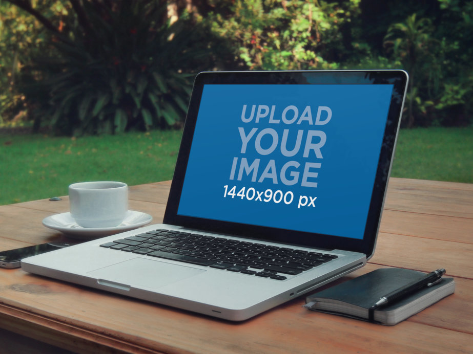 Placeit - Mockup of a MacBook on an Outdoor Desk
