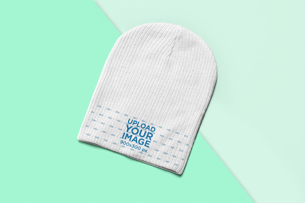 Placeit - Mockup of a Knit Beanie Laying Flat on a Surface with Two Colors