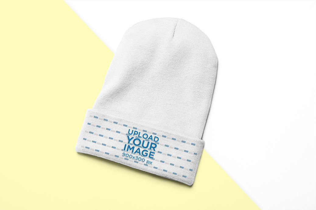 Placeit - Flat Lay Beanie Mockup Featuring a Bicolor Surface