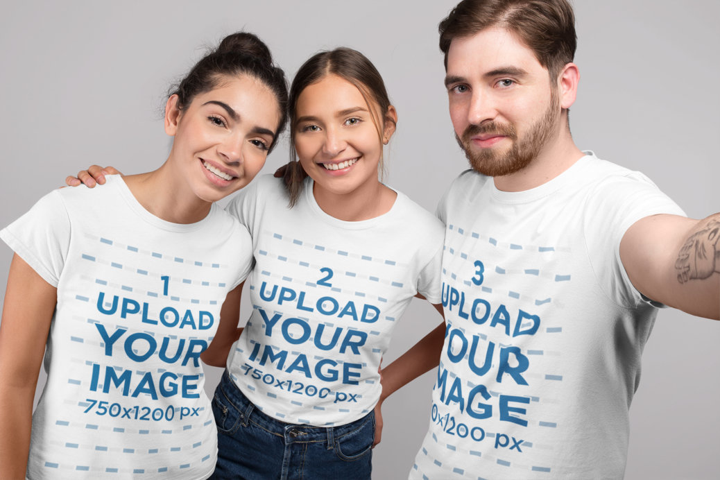 Placeit - Selfie Mockup of Three Friends Wearing Tshirts at a Studio