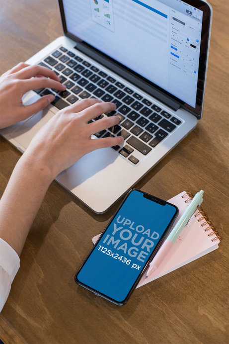 Placeit - iPhone 11 Pro Mockup Featuring a Girly Desk