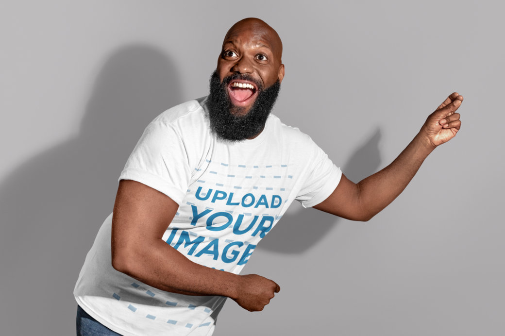 Placeit - T-Shirt Mockup of a Happy Man Snapping His Fingers