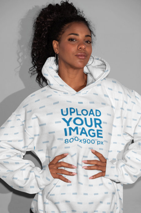 Placeit - Pullover Hoodie Mockup Featuring a Woman Holding Her Waist