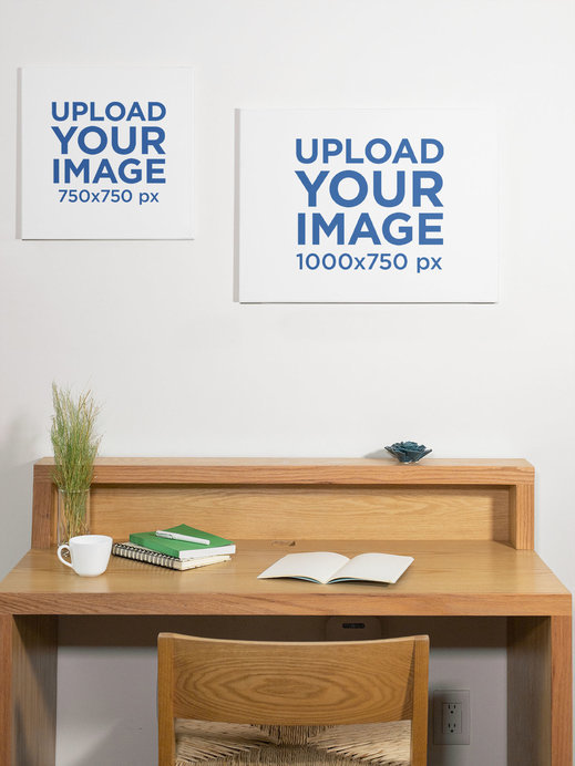 Placeit - Mockup of Two Canvas Prints Hanging on a Wall