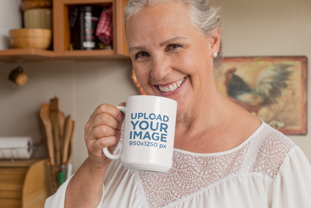 Placeit - 15 Oz Coffee Mug Mockup of a Joyful Old Woman at Her Home