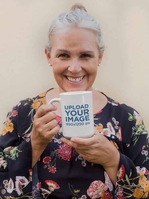 Placeit - 15 Oz Coffee Mug Mockup of a Senior Woman Smiling at the Camera