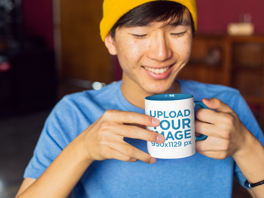 Placeit - Two-Toned 11 Oz Coffee Mug Mockup Featuring a Smiling Man