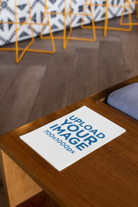 Placeit - Mockup of a Pile of A5 Flyers Lying on a Wooden Table