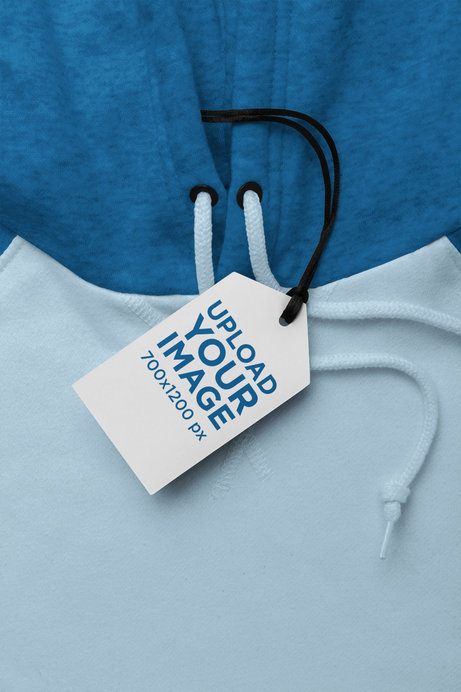 Placeit - Mockup of a Brand Tag Attached to a Pullover Hoodie