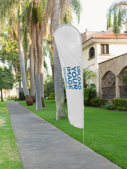 Placeit - Mockup of a Flag Banner by a Sidewalk