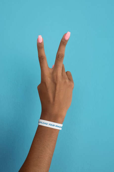 Placeit - Silicone Wristband Mockup of a Woman's Hand Making the Peace Sign