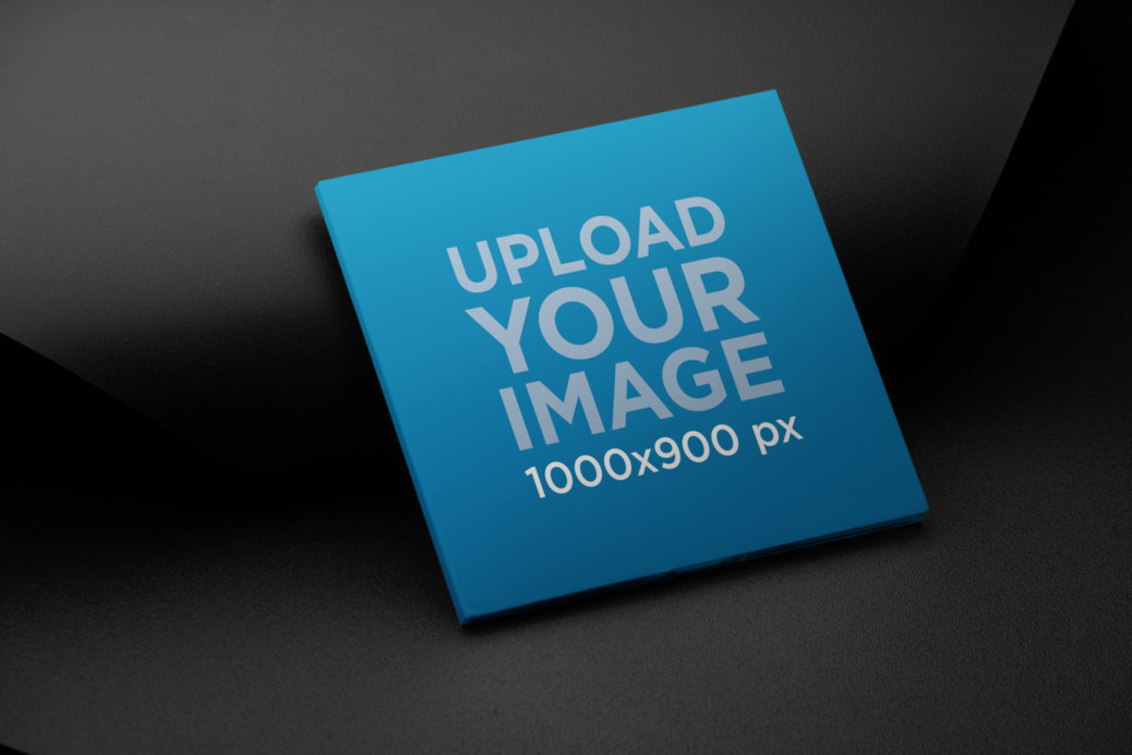 Placeit - Mockup of a Digipak Placed Against a Black Background